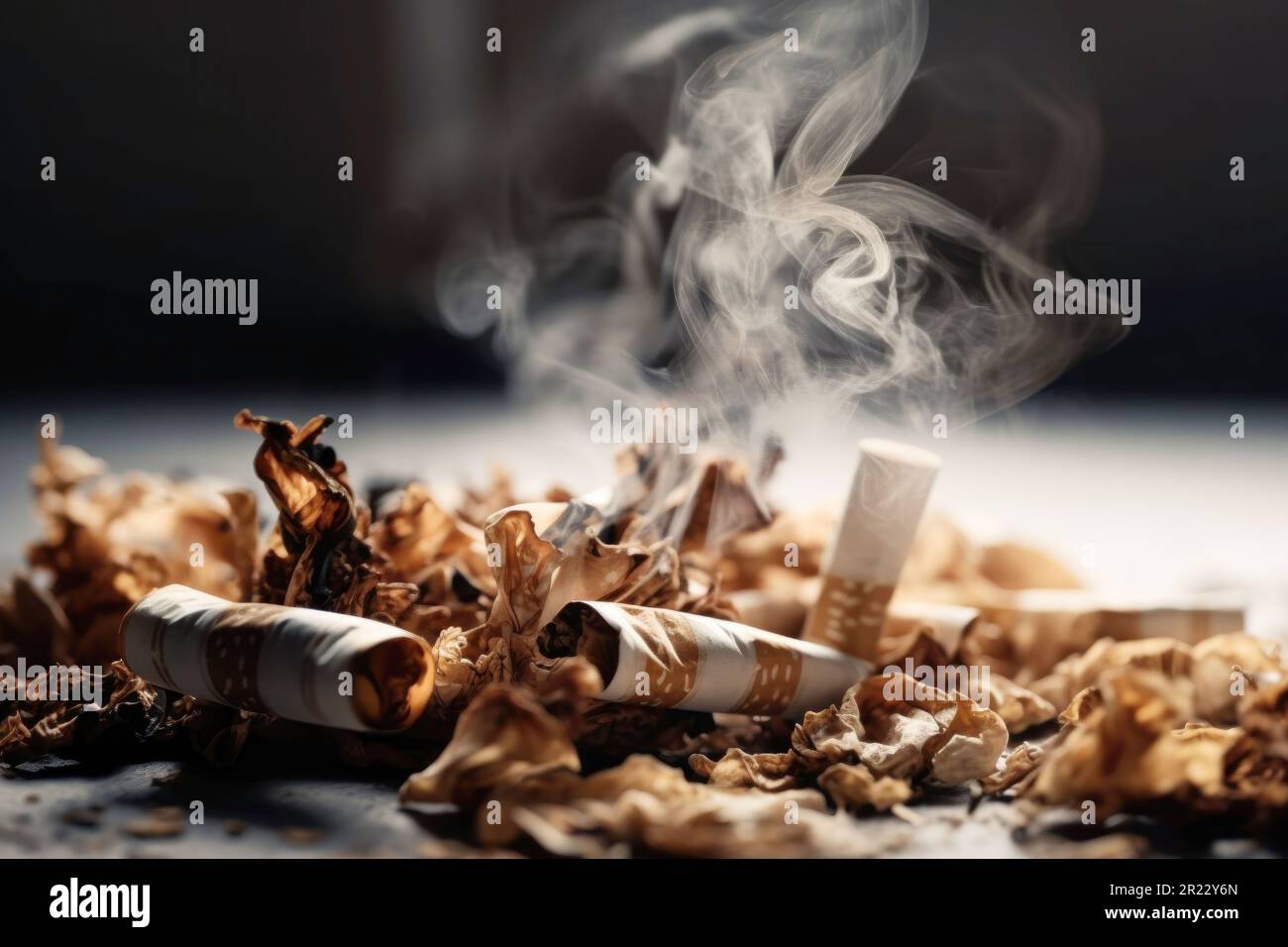 A pile of extinguished and crumpled cigarettes, cigarette burning and ...