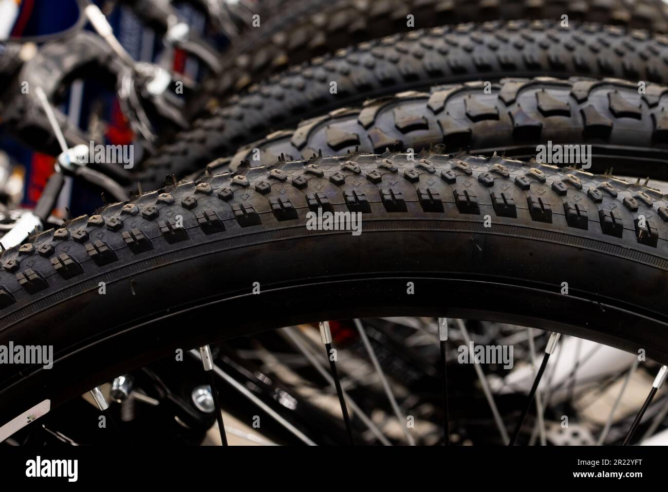 store has a new assortment of bicycle tires in storage, a stack of ...