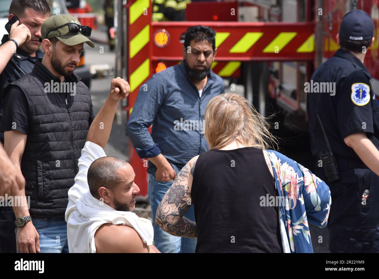 Paterson, United States. 16th May, 2023. Residents of a home damaged by ...