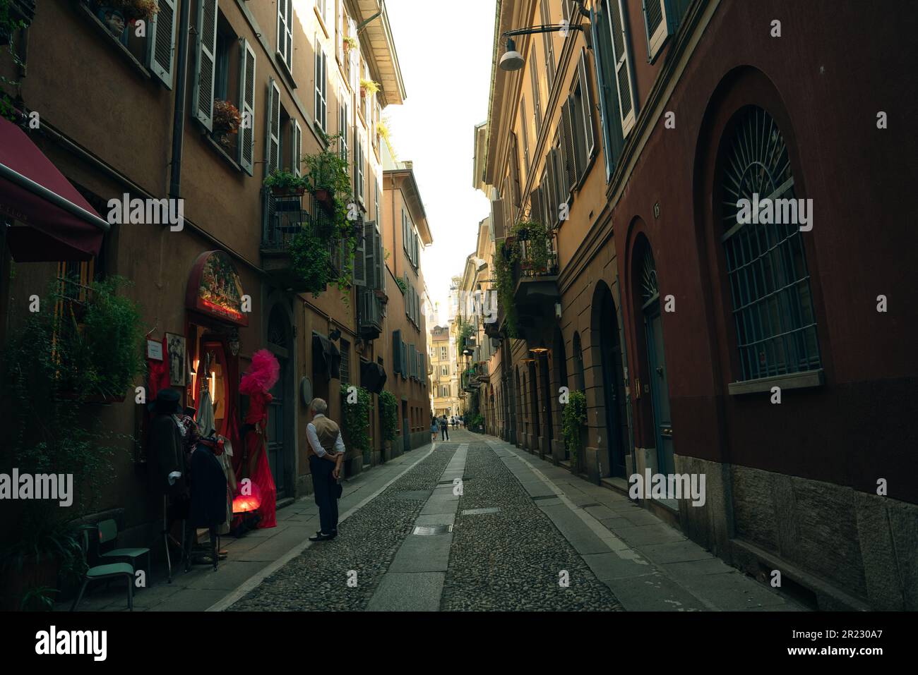 The street with ancient buildings in the center of Milan, Italy. High ...