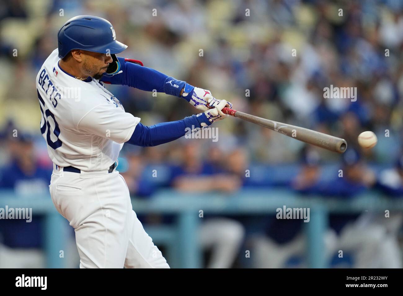 Los Angeles Dodgers' Mookie Betts (50) doubles during the first inning ...