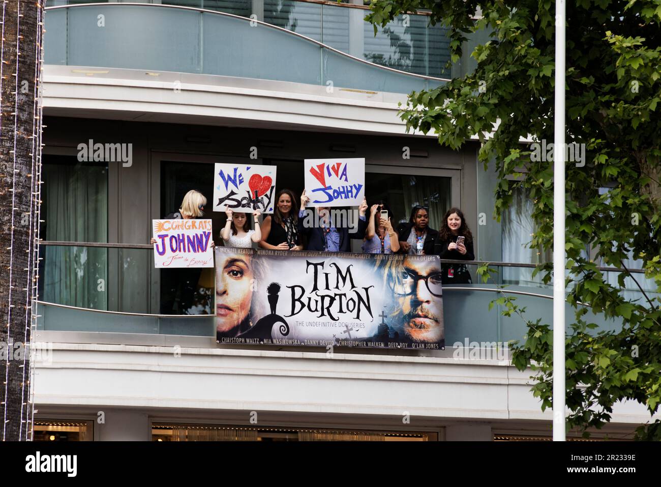 Cannes, France. 16th May, 2023. Johnny Depp fans hold signs and a ...