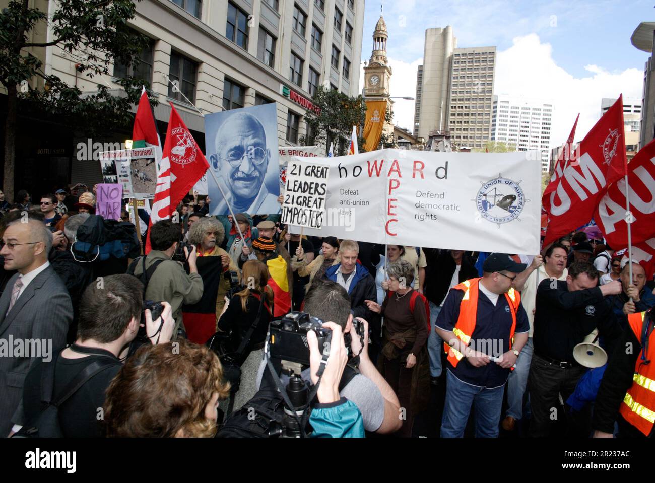 Anti-APEC and anti-Bush protesters conduct a rally on Park Street in ...
