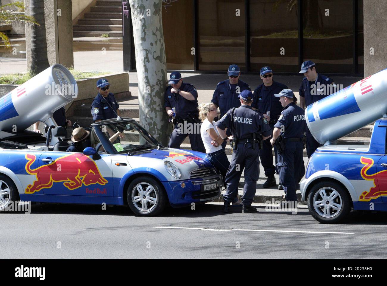 Police on duty during APEC drink 'Red Bull' energy drinks on College ...