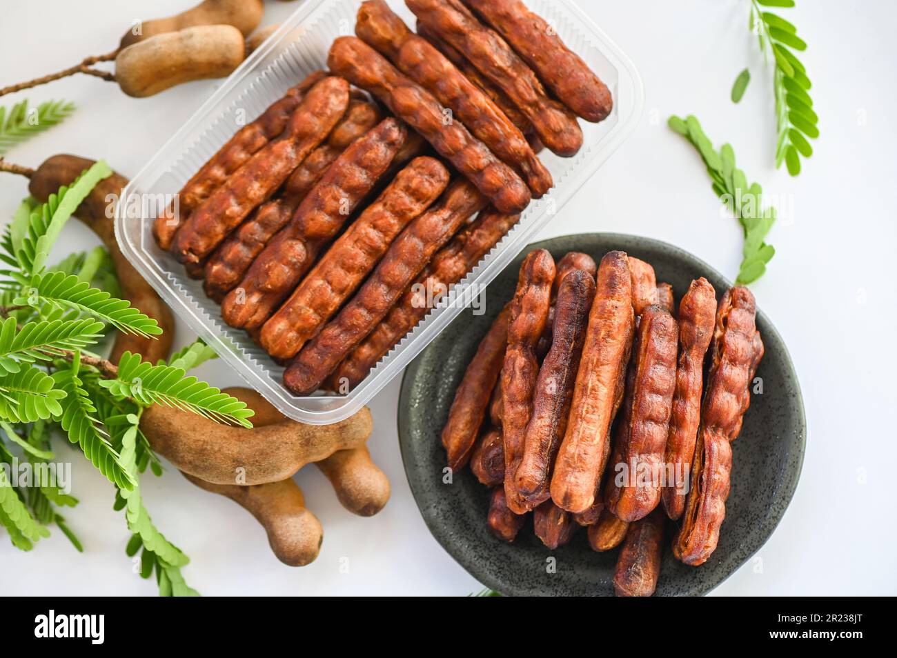 Tamarind sweet for food fruit ripe tamarinds on plate and white ...