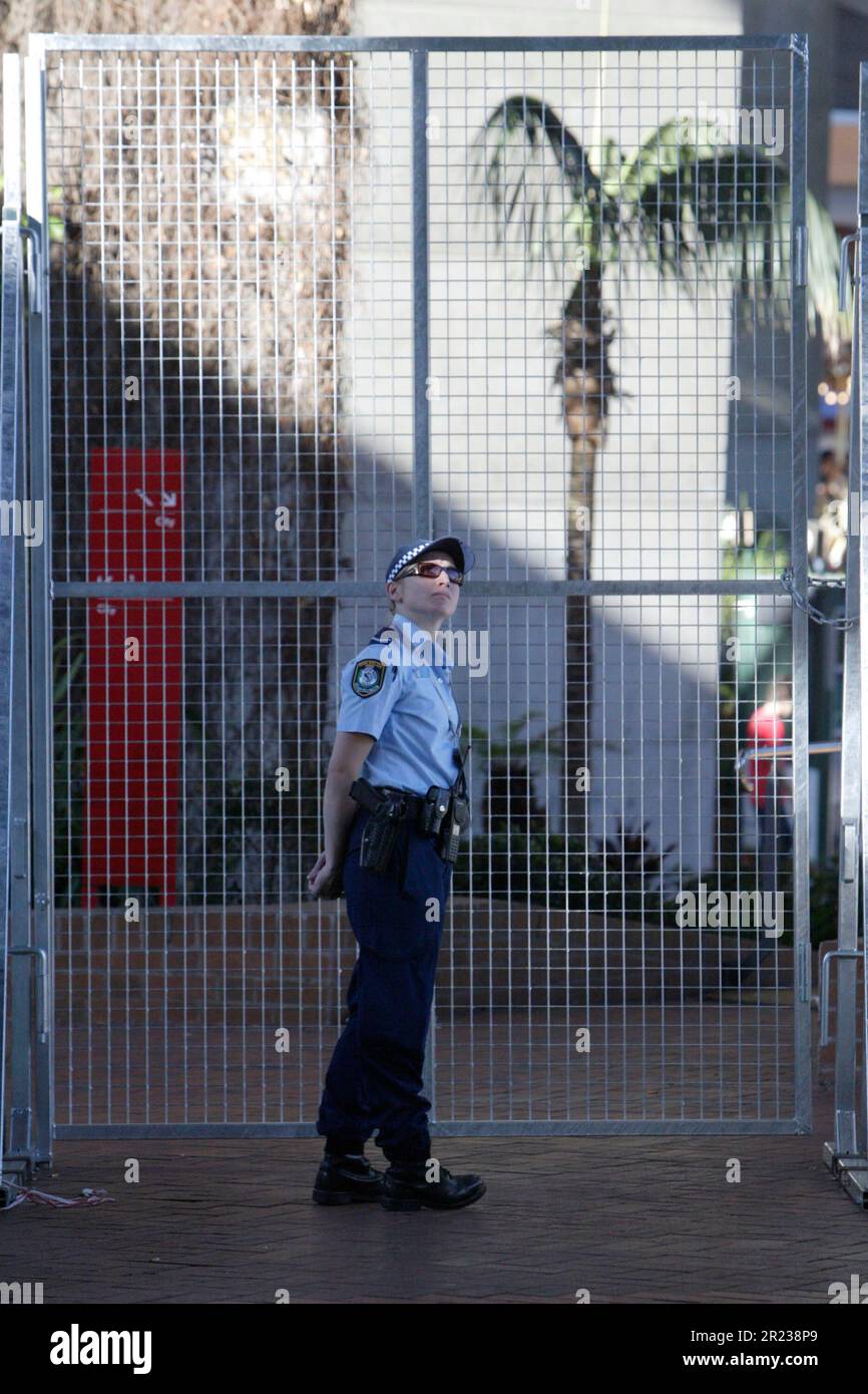 A police officer guards the perimeter of the Sydney Convention and ...