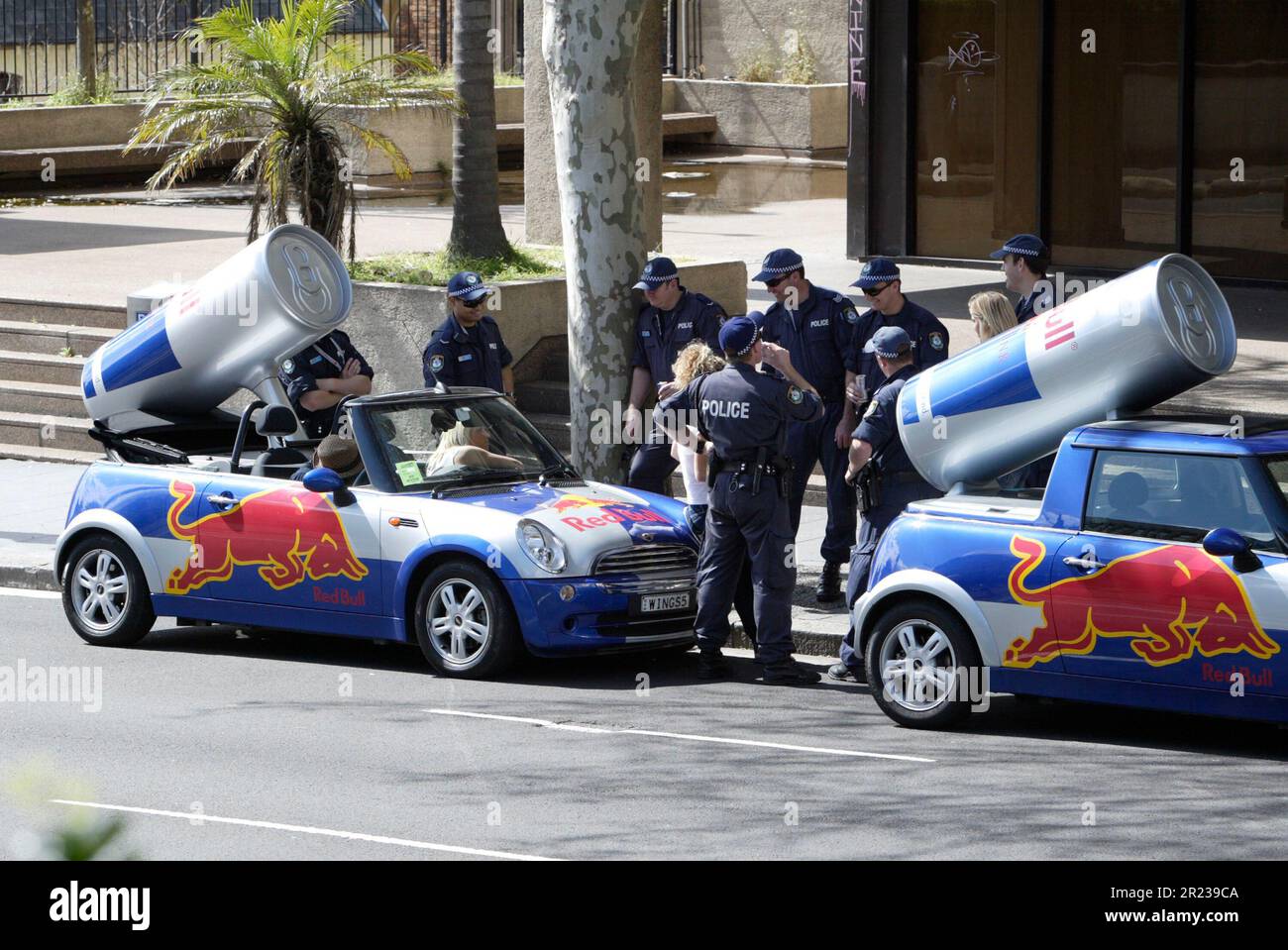 Police on duty during APEC drink 'Red Bull' energy drinks on College ...