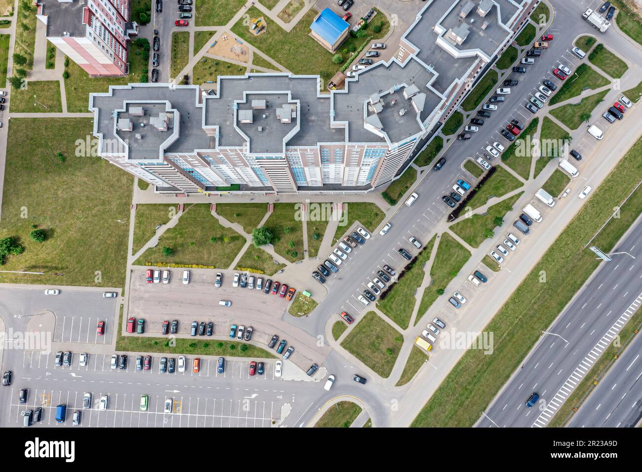 parking lot near high-rise apartment houses in a residential area ...