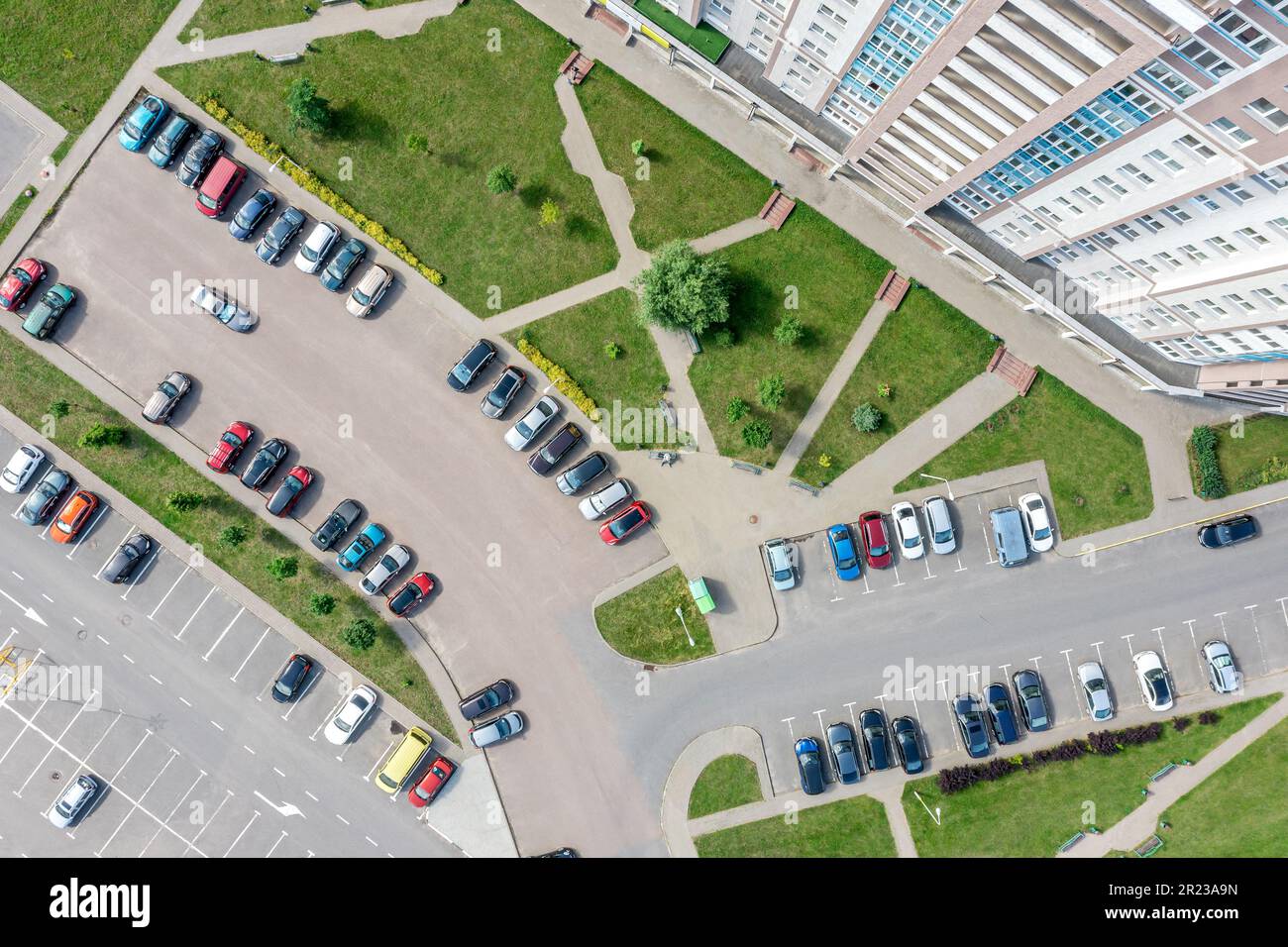 aerial top view of outdoor parking lot near new residential house ...