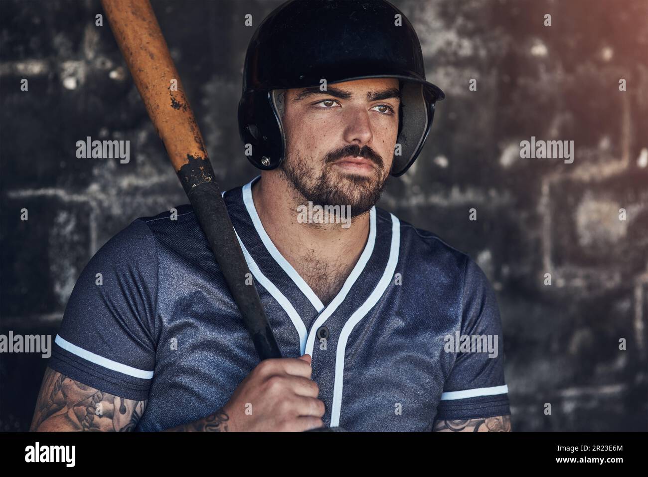 Baseball player holding bat looking hi-res stock photography and images ...