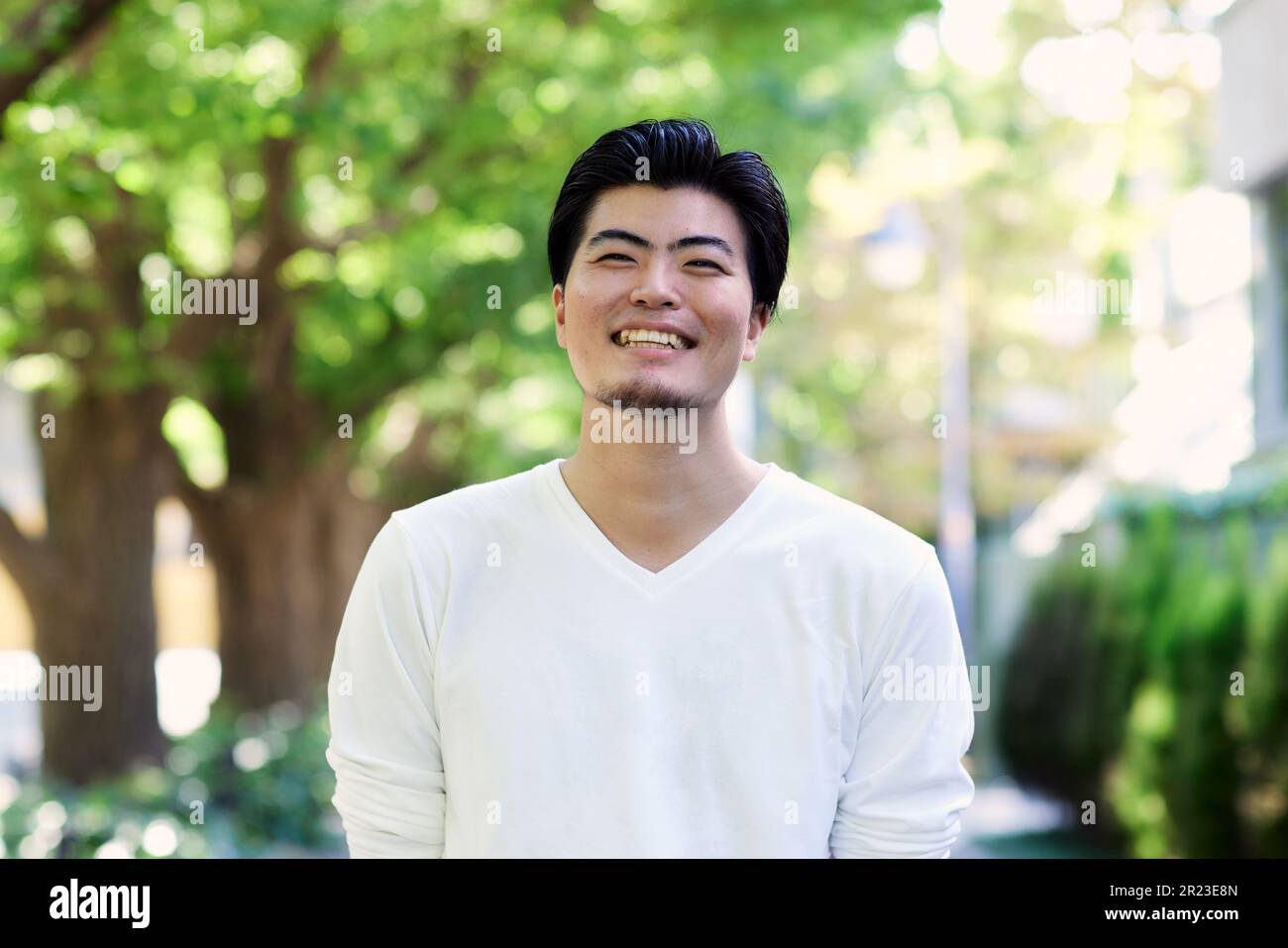 Japanese man portrait in downtown Tokyo Stock Photo - Alamy