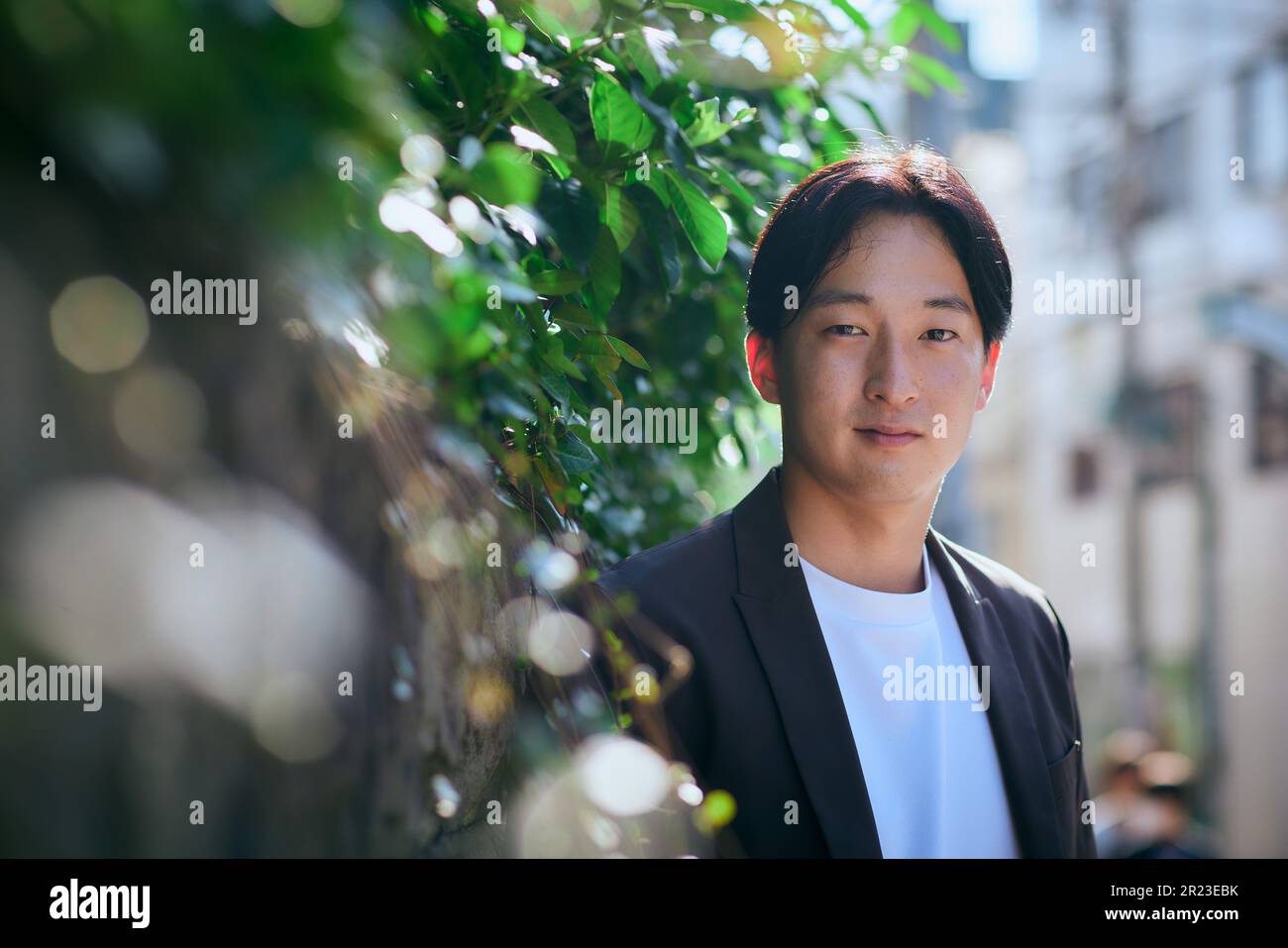 Japanese man portrait in downtown Tokyo Stock Photo - Alamy