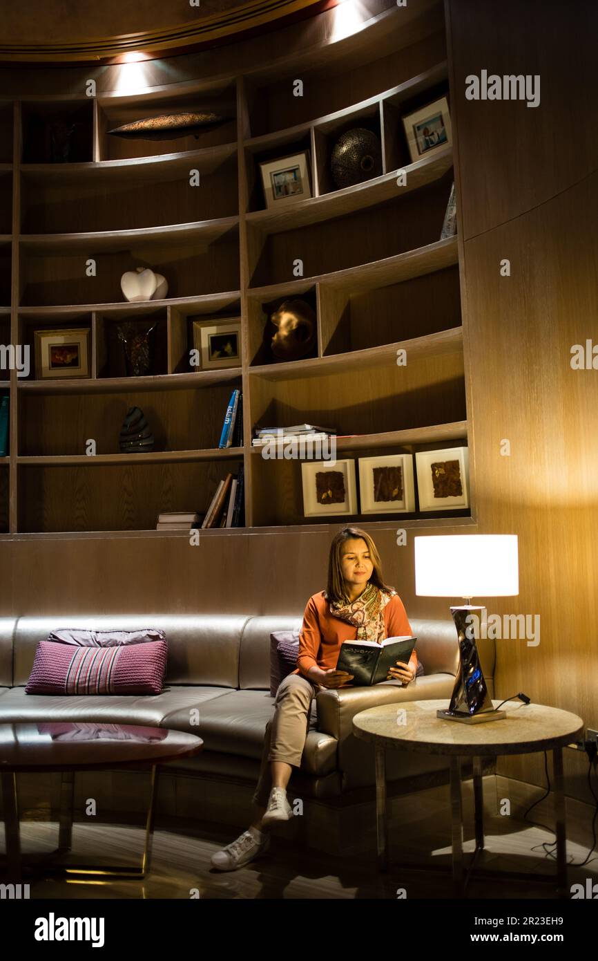 A single female model inside a luxury hotel in Abu Dhabi, UAE Stock ...