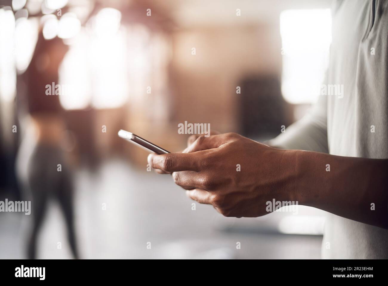 Power up your workout with this app. an unrecognizable man using a ...