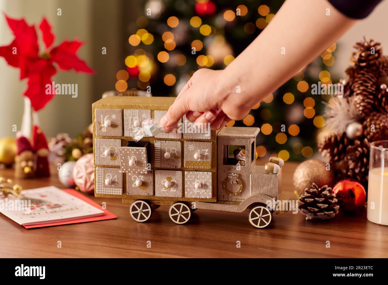 Woman winter advent calendar hi-res stock photography and images - Alamy