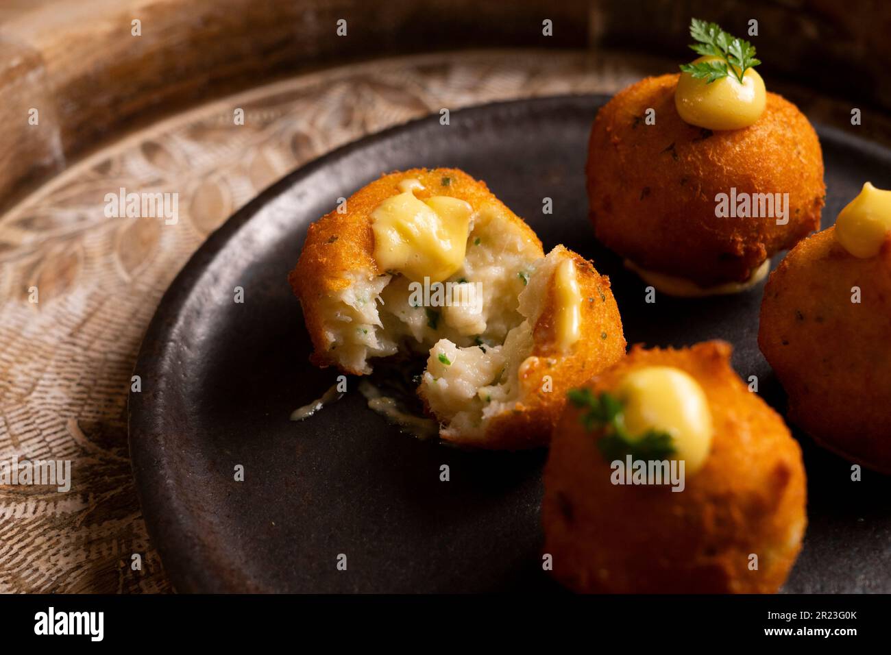Cod fritters. Traditional Spanish tapa recipe Stock Photo - Alamy