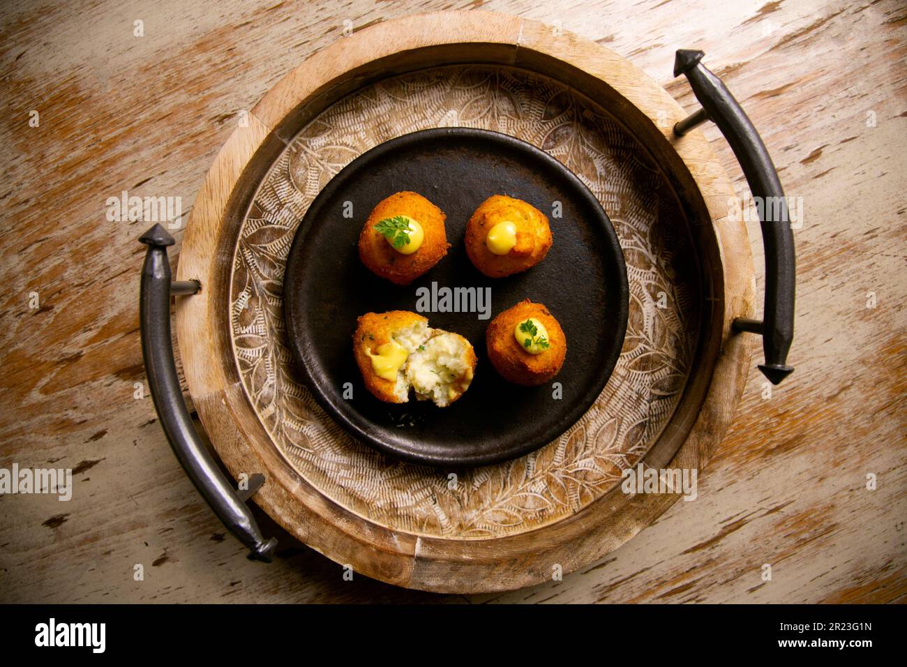 Cod fritters. Traditional Spanish tapa recipe Stock Photo - Alamy