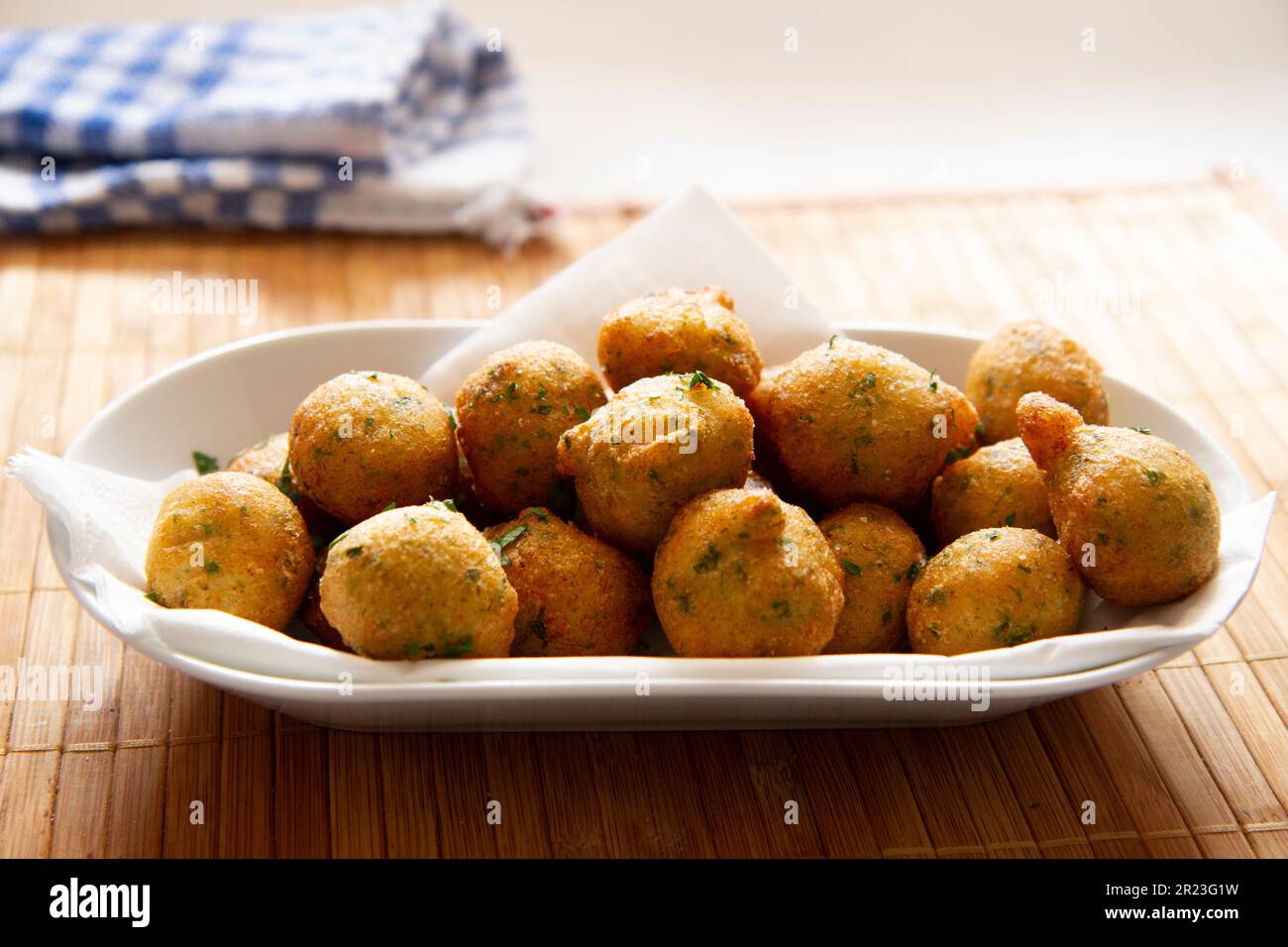 Cod fritters. Traditional Spanish tapa recipe Stock Photo - Alamy