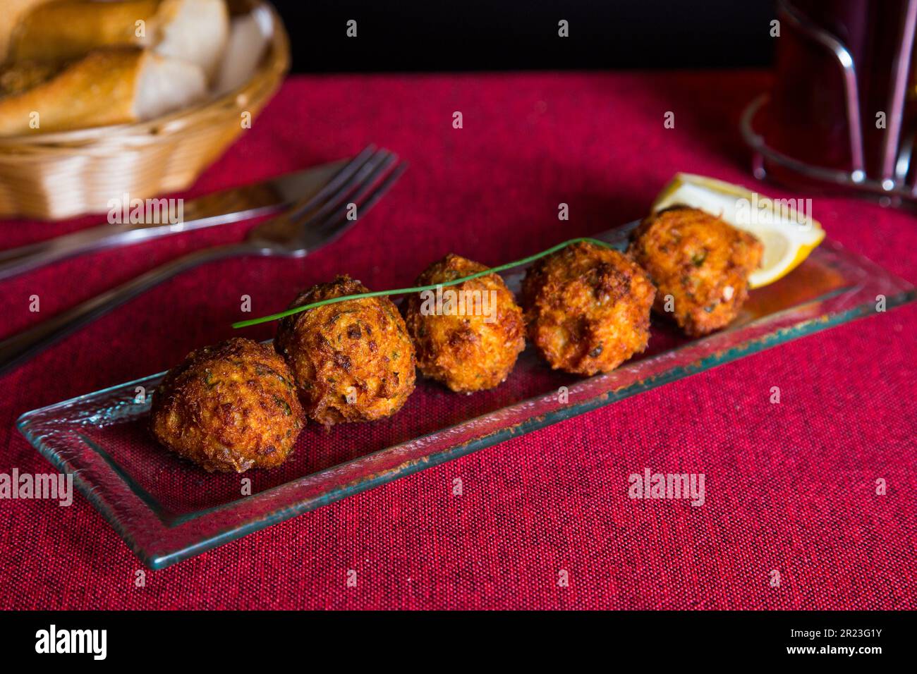 Cod fritters. Traditional Spanish tapa recipe Stock Photo - Alamy