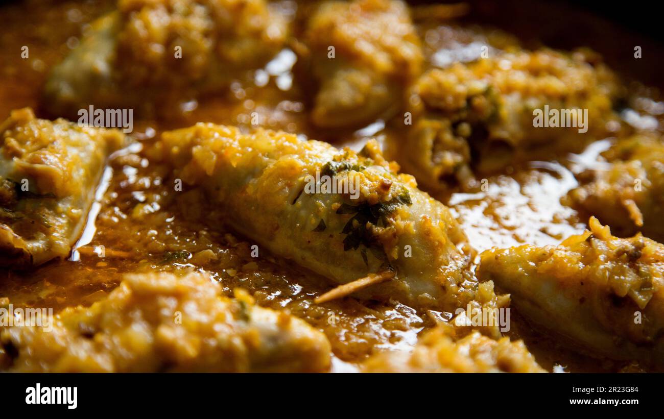 Squid stuffed with meat and vegetables. Traditional Spanish recipe ...