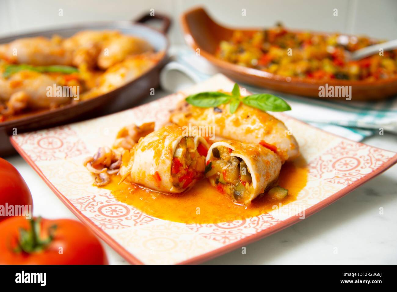 Tasty grilled squid tubes hi-res stock photography and images - Alamy