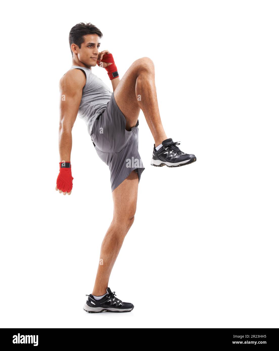 Working on his technique for the next fight. Full body of a handsome ...