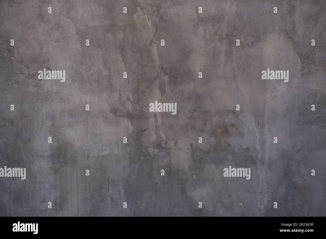 Stone surface with dark spots. The texture of old flagstone in the ...