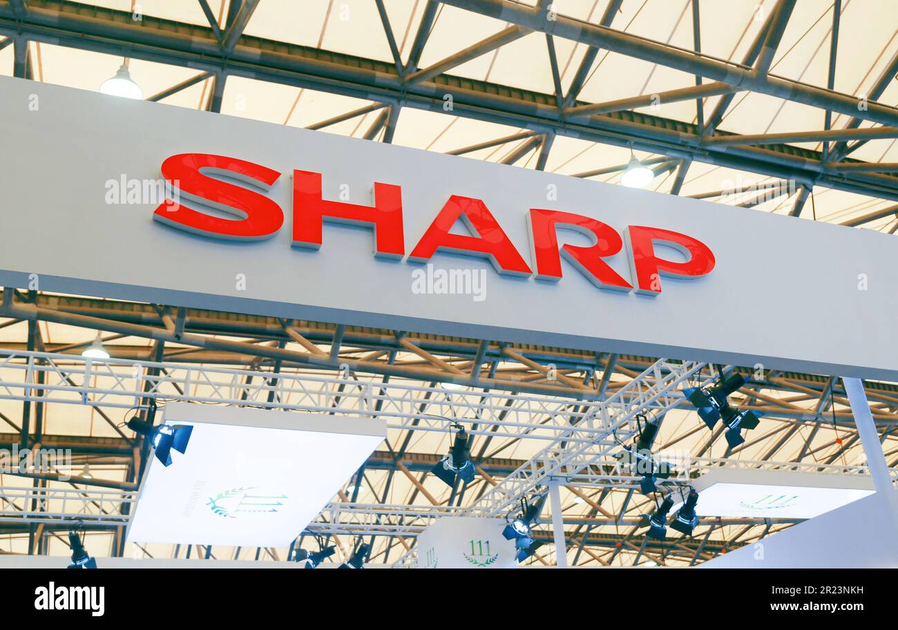 SHANGHAI, CHINA - APRIL 27, 2023 - Visitors look at the SHARP booth at ...