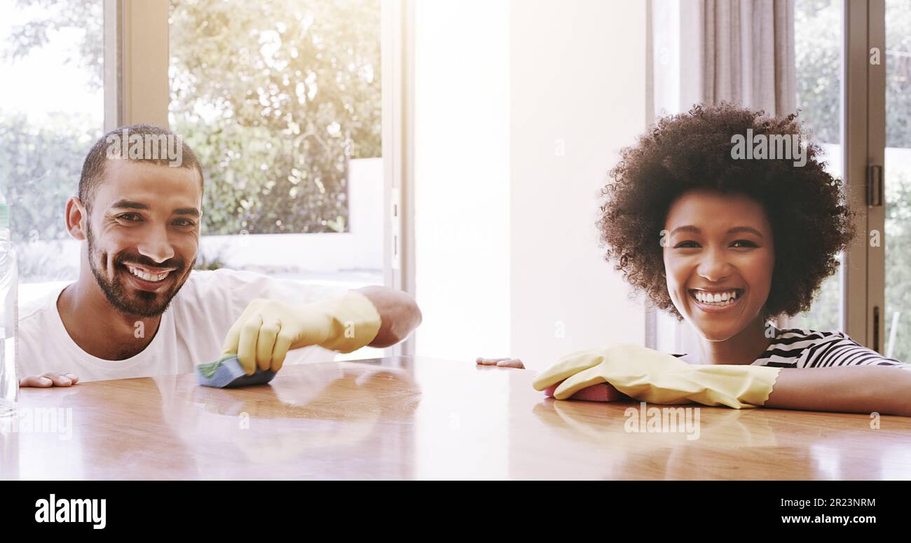 Happy couple, portrait and home for cleaning furniture, table and ...
