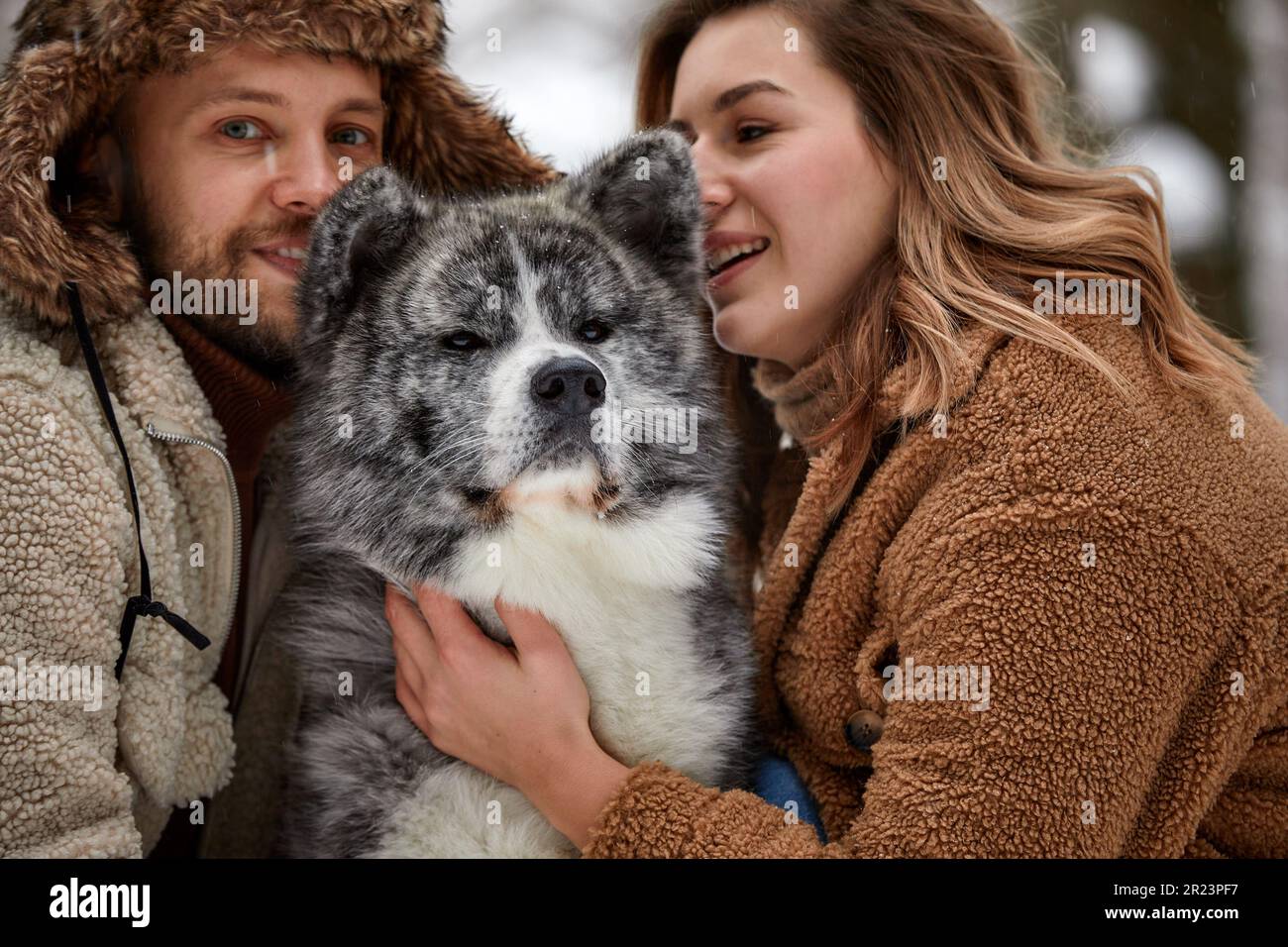 Portrait of a young beautiful couple of European appearance with a ...