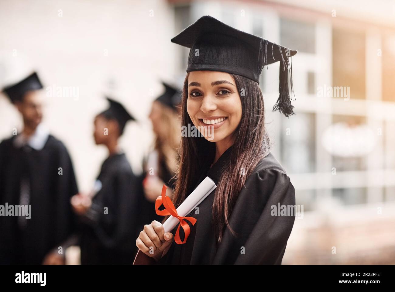 Graduation, diploma and portrait of a woman or college student with ...