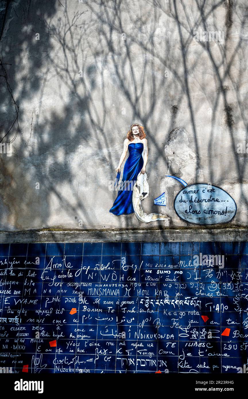 A painting of a woman on a wall Stock Photo - Alamy