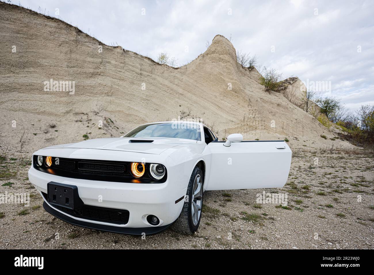 White powerfull american muscle car in career Stock Photo - Alamy