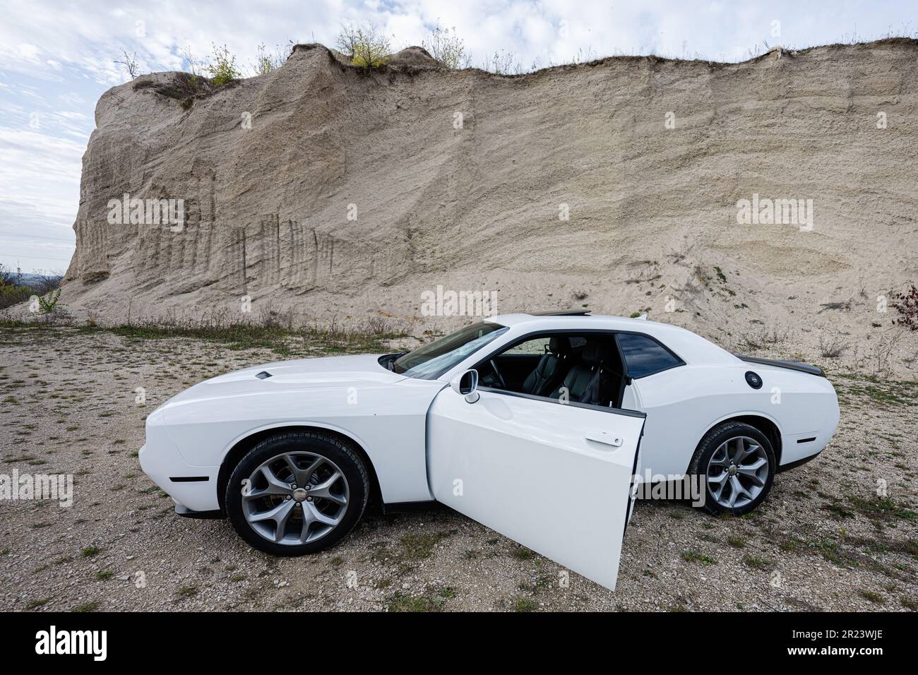 White powerfull american muscle car in career Stock Photo - Alamy