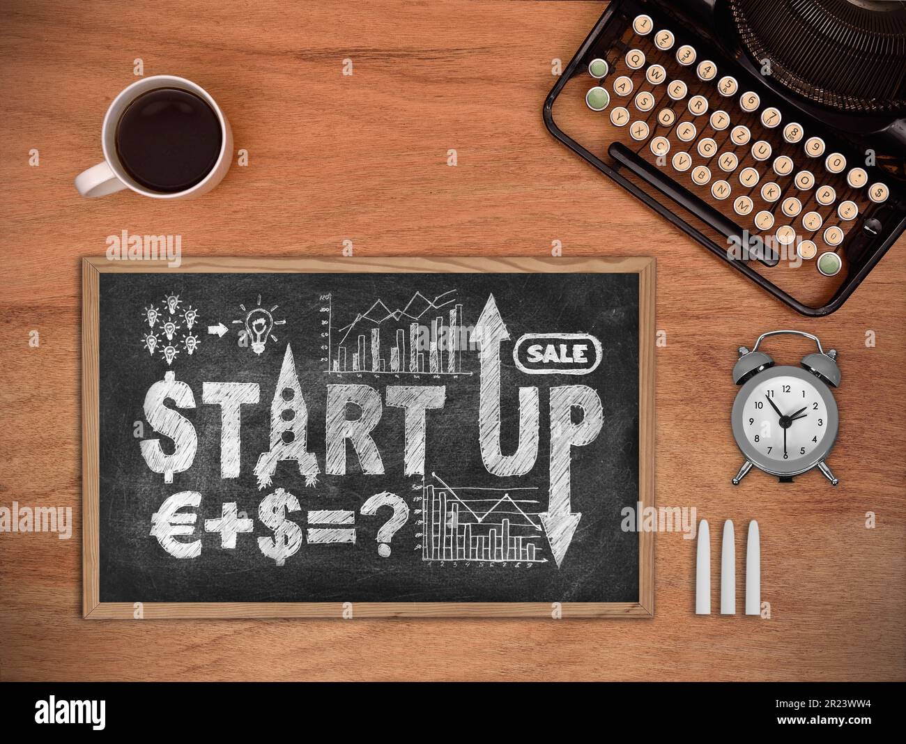 start up concept drawing on blackboard Stock Photo - Alamy