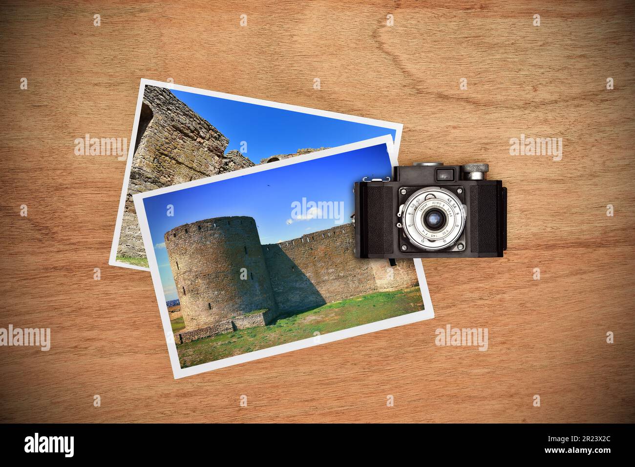 Vintage camera and two photos with medieval castle Stock Photo - Alamy