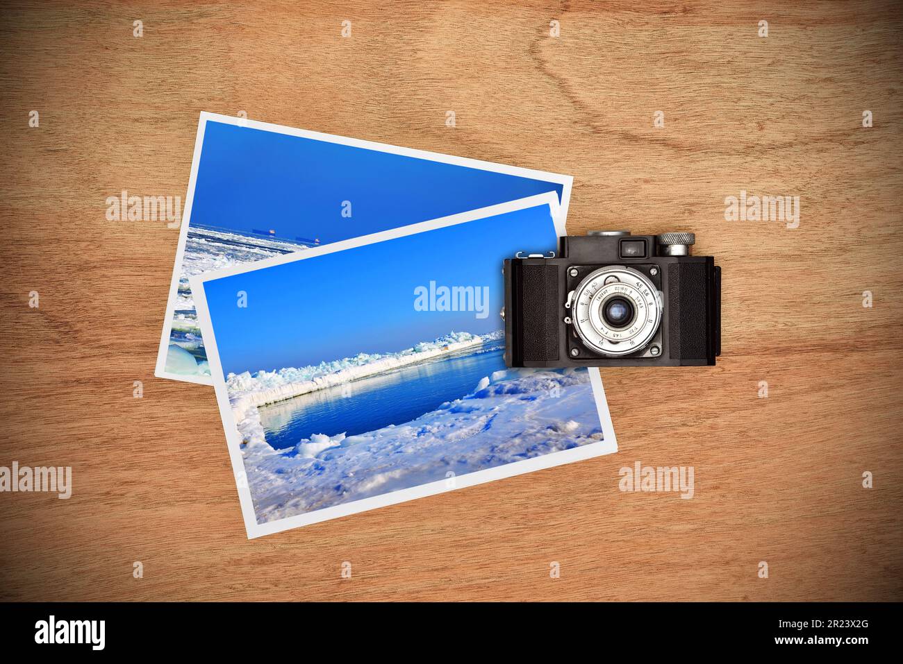 Vintage camera and two photos with ice and icebergs Stock Photo - Alamy