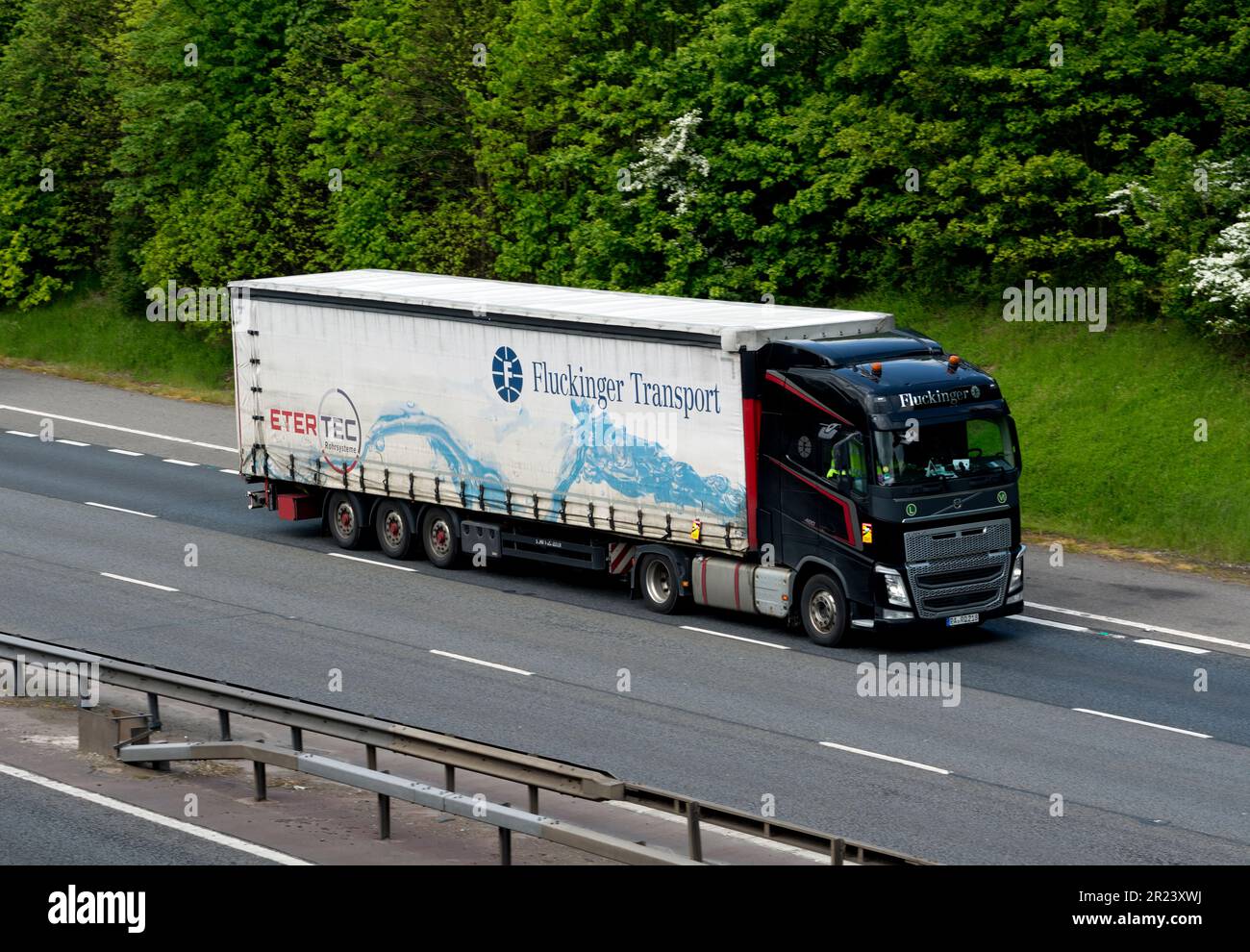 Fluckinger Transport lorry on the M40 motorway, Warwickshire, UK Stock ...
