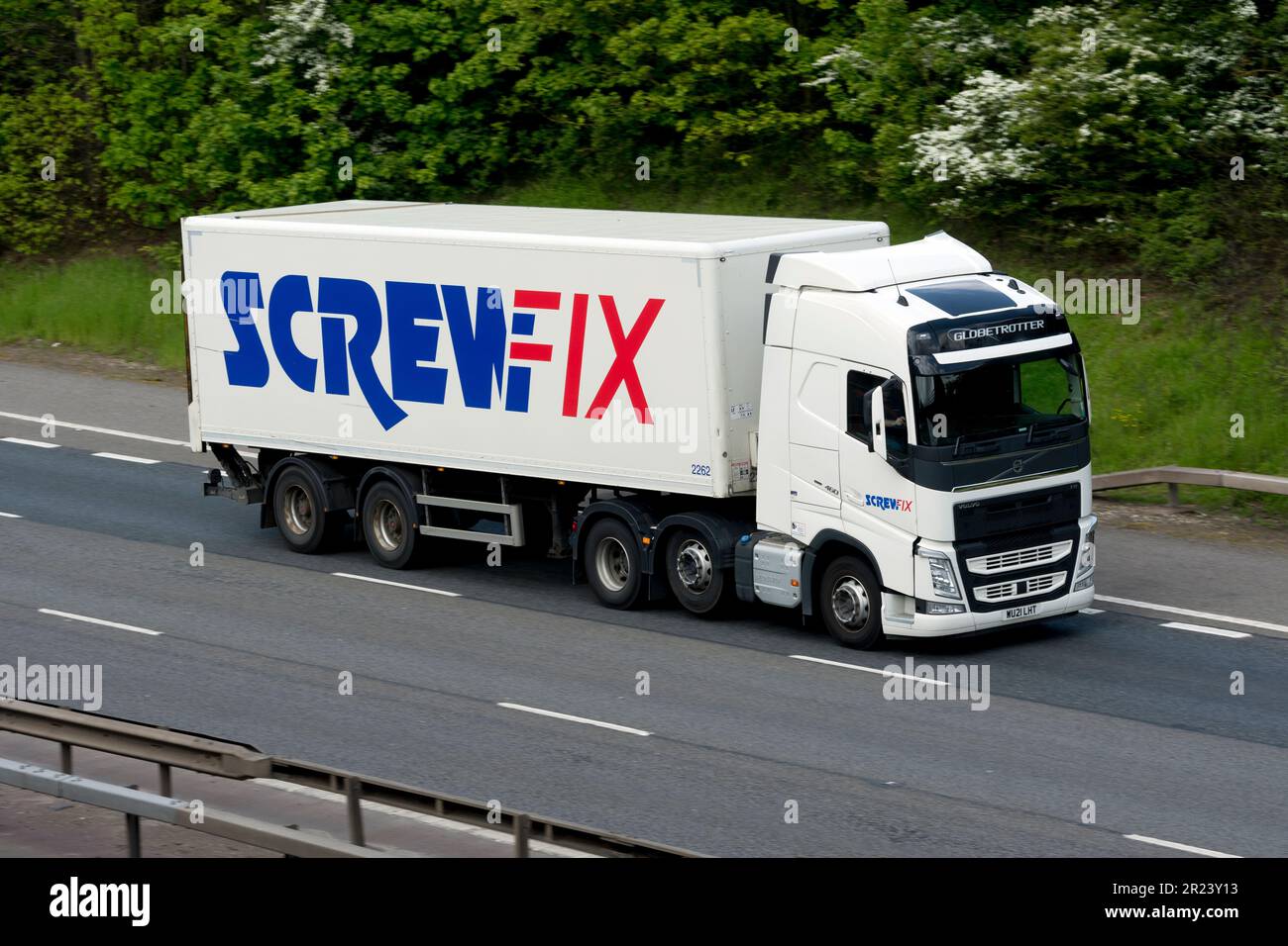 Screwfix lorry on the M40 motorway, Warwickshire, UK Stock Photo - Alamy