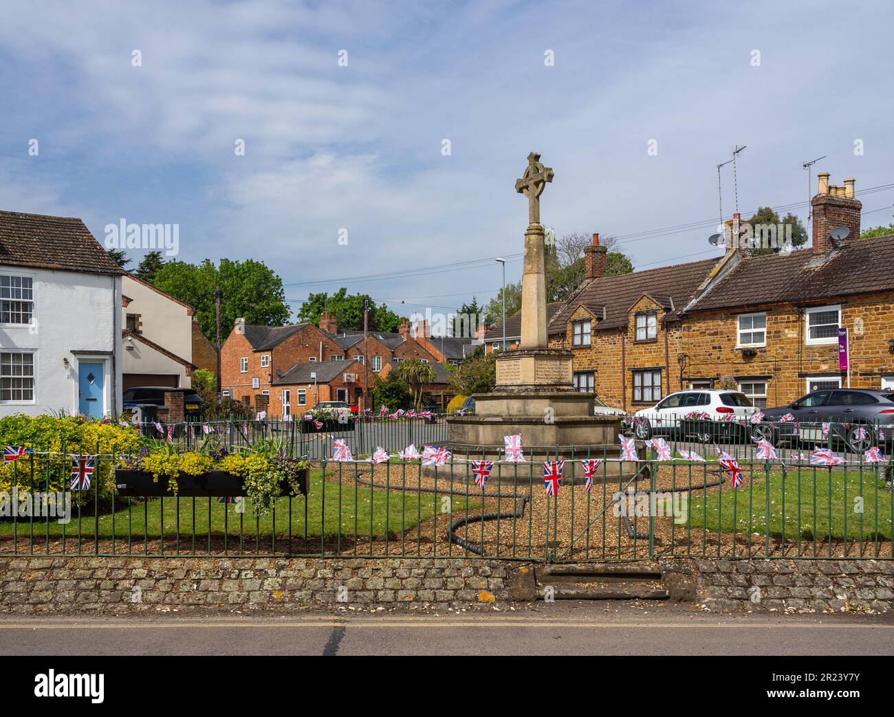 Village green with war memorial and Union Jack bunting, Hardingstone ...