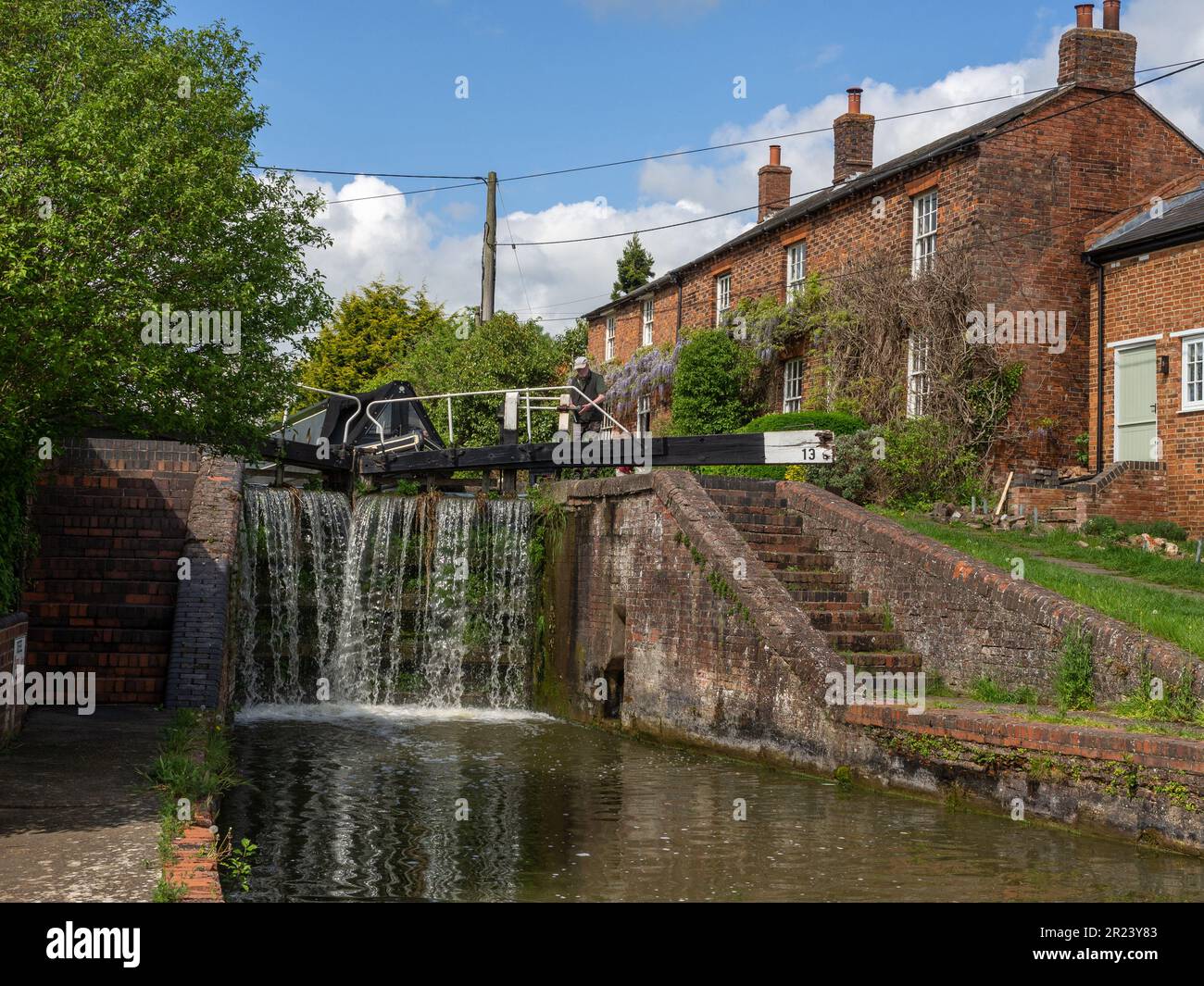 Lock gate with cascading water on the Grand Union canal, Whilton Locks ...