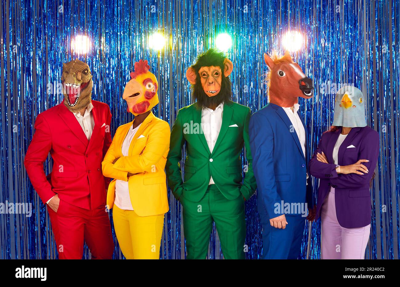 Group of people in animal head masks standing shiny background Stock ...