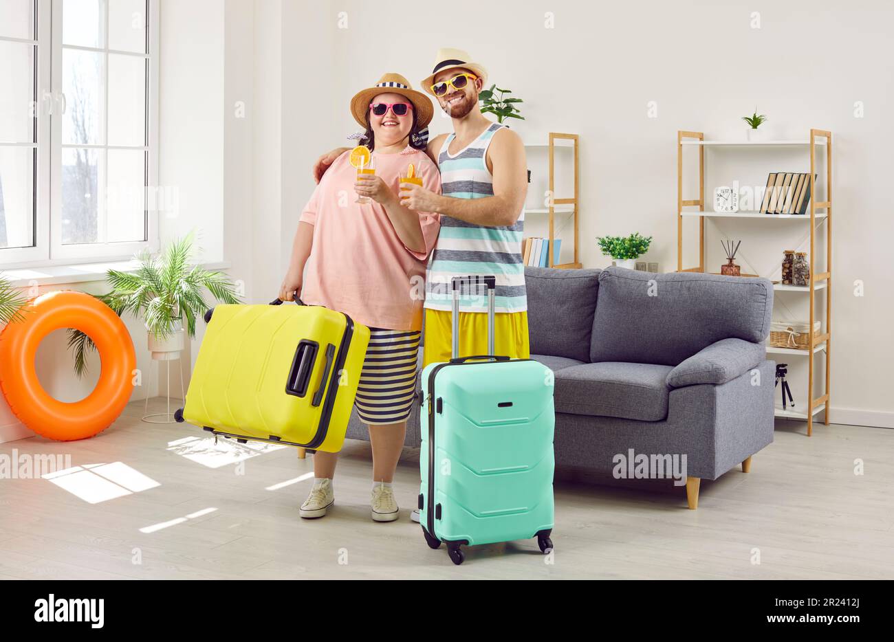 Happy family couple enjoying summer vacation, going on trip, and ...