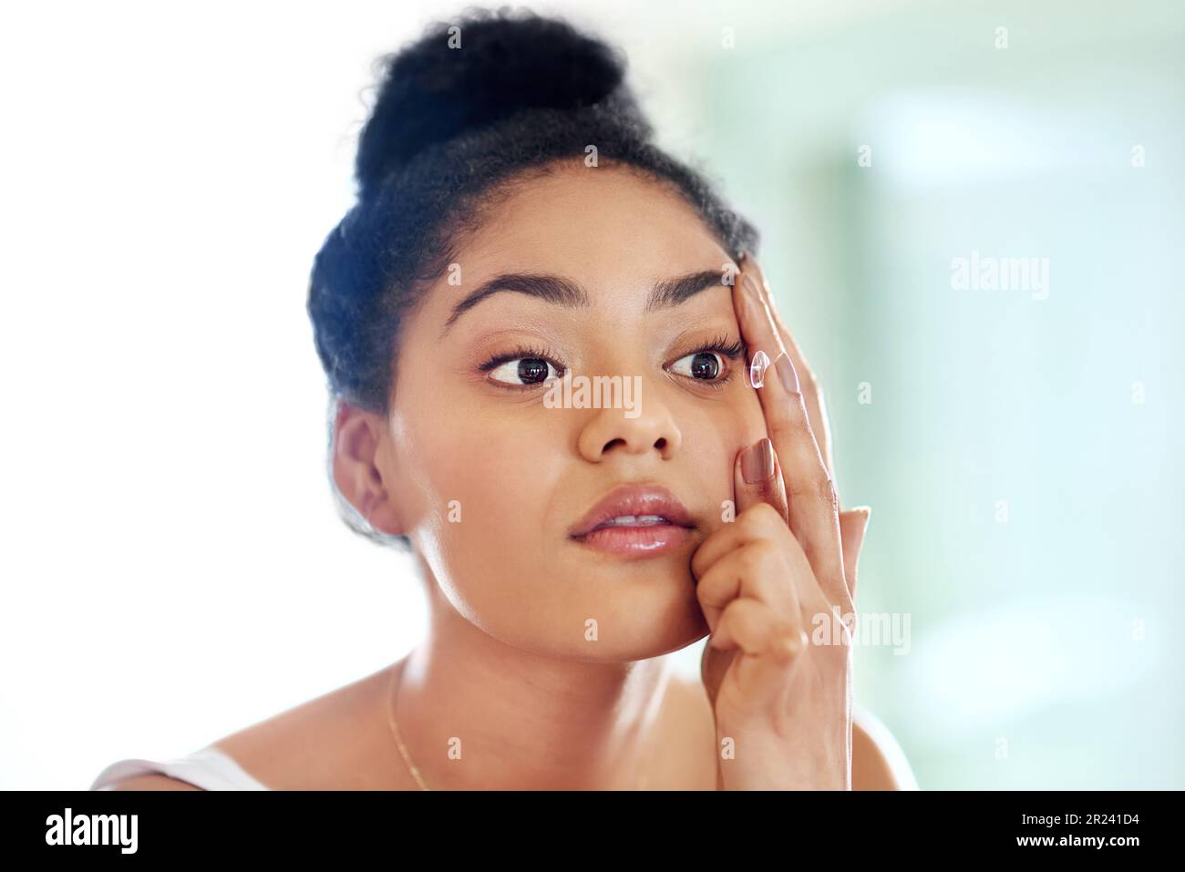 Vision, girl and woman putting in contact lenses, home and eyecare with ...