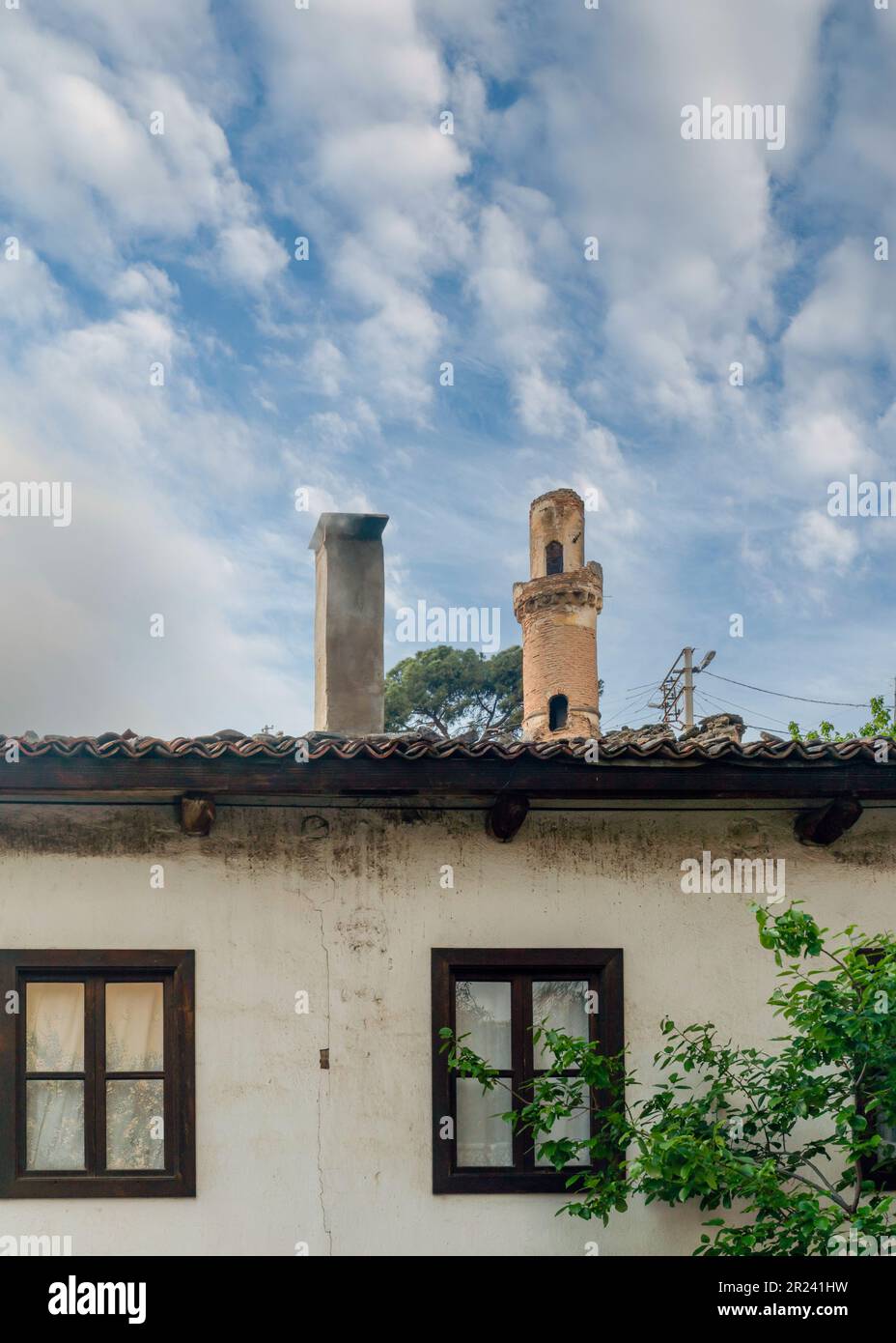 Traditional house with Guduk Minaret in Birgi which is a small town ...