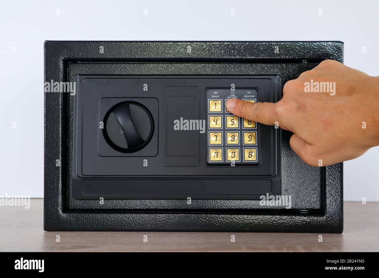 Hand press key on safety digital lock with coded password - Small hotel ...