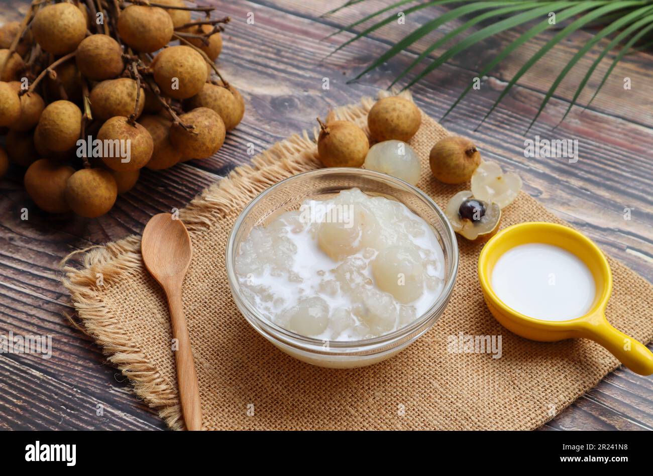 Sticky rice boiled in syrup with longan and coconut milk dressing at ...