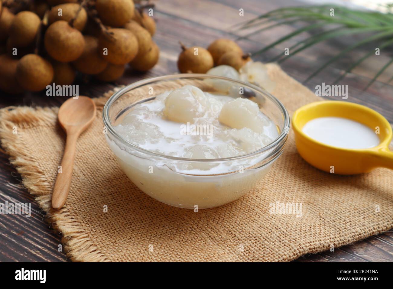 Sticky rice boiled in syrup with longan and coconut milk dressing at ...