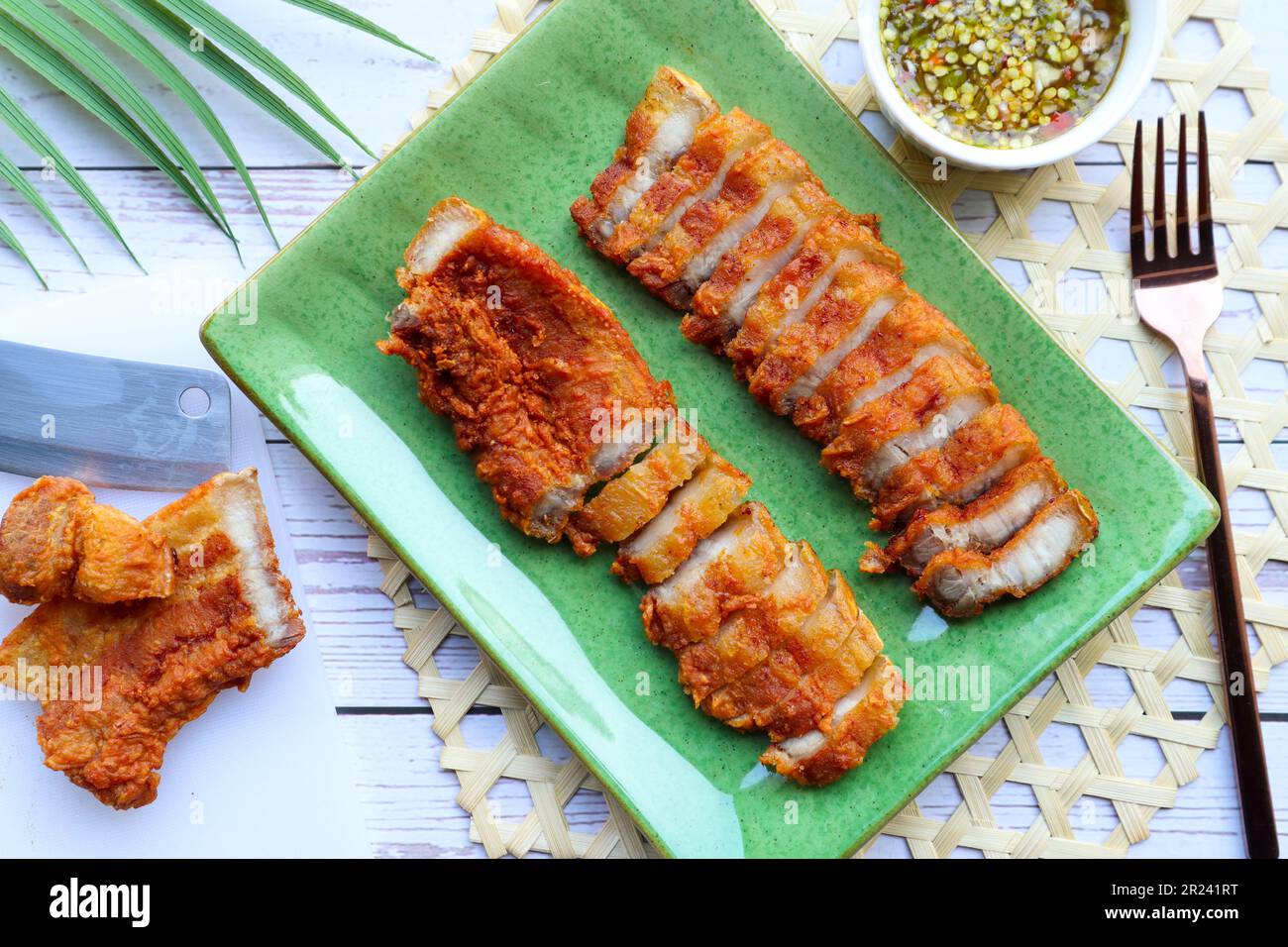 Deep Fried Pork Belly With Spicy Sauce In Thai Called Moo Tord At Top