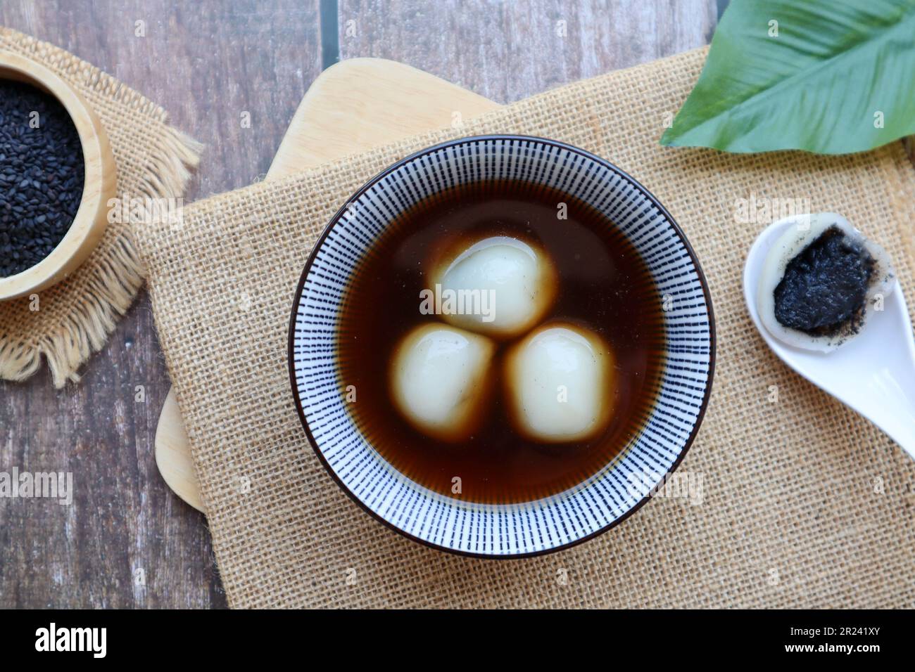 Tang Yuan - Glutinous filled with black sesame in ginger syrup, sweet ...